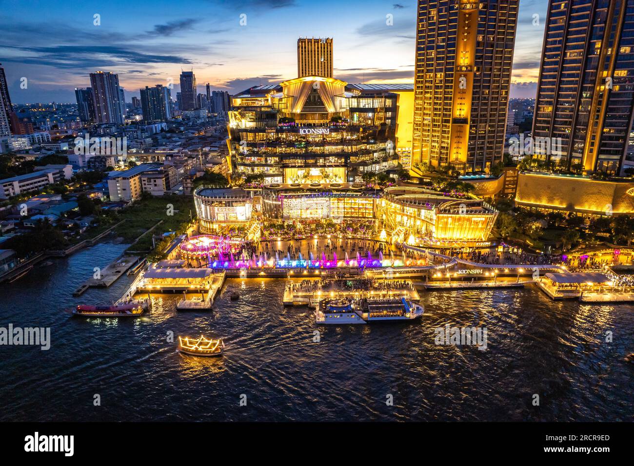 Aerial view of Icon Siam mall by night on the chao phraya river in ...