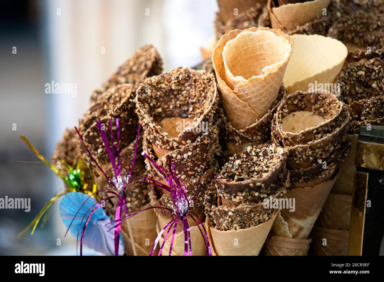 Cornet ice cream cones with chocolate. shooting outside Stock Photo - Alamy