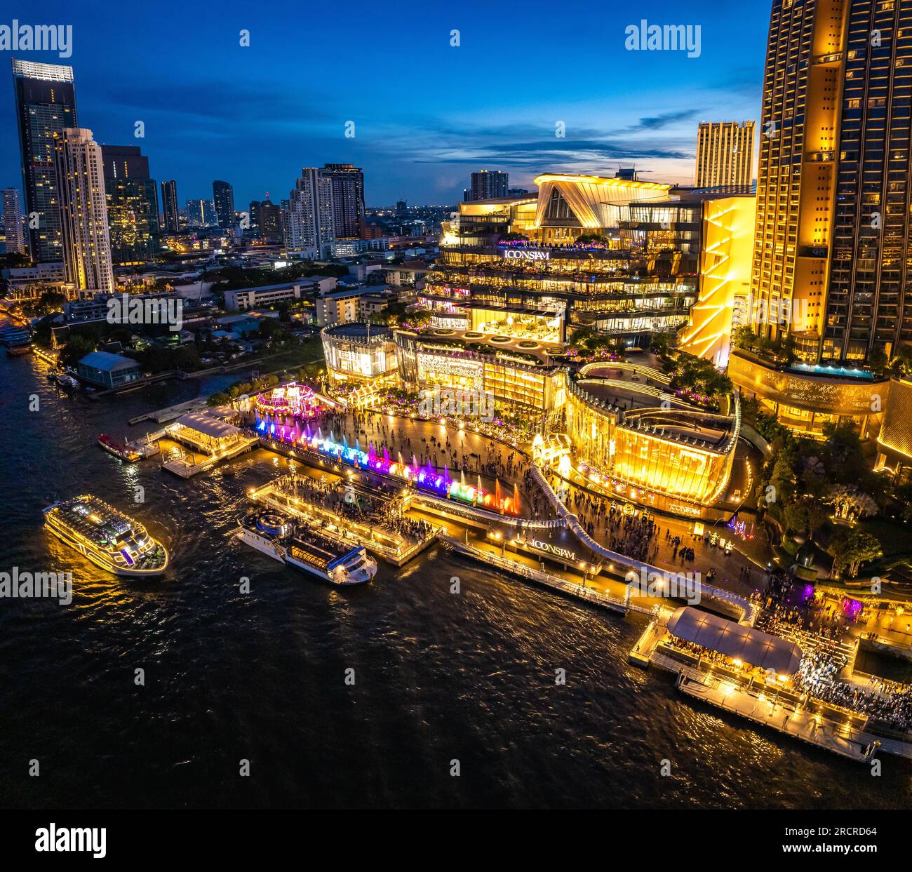 Aerial view of Icon Siam mall by night on the chao phraya river in ...