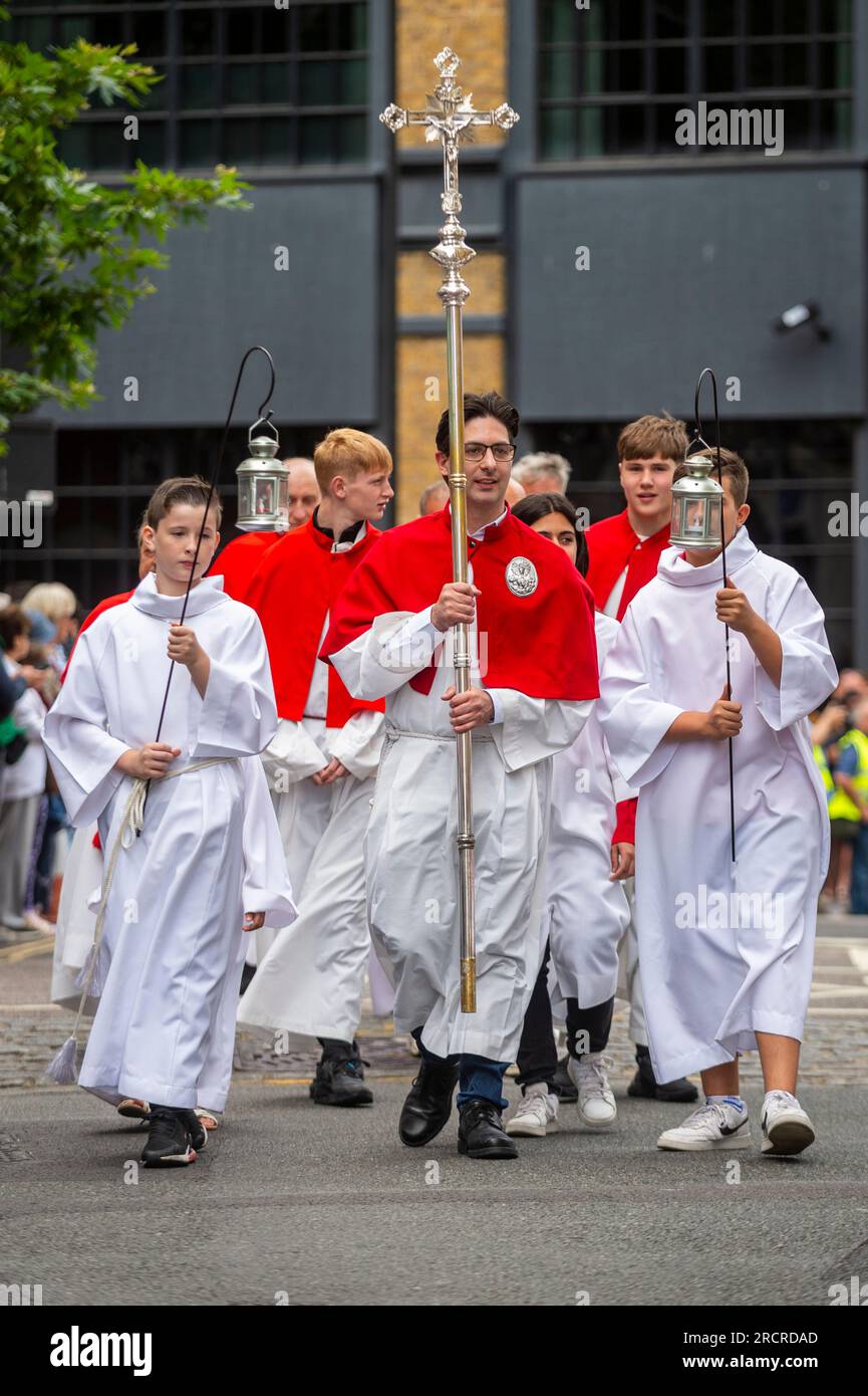 London, UK. 16 July 2023. A cross is carried during the Procession of ...