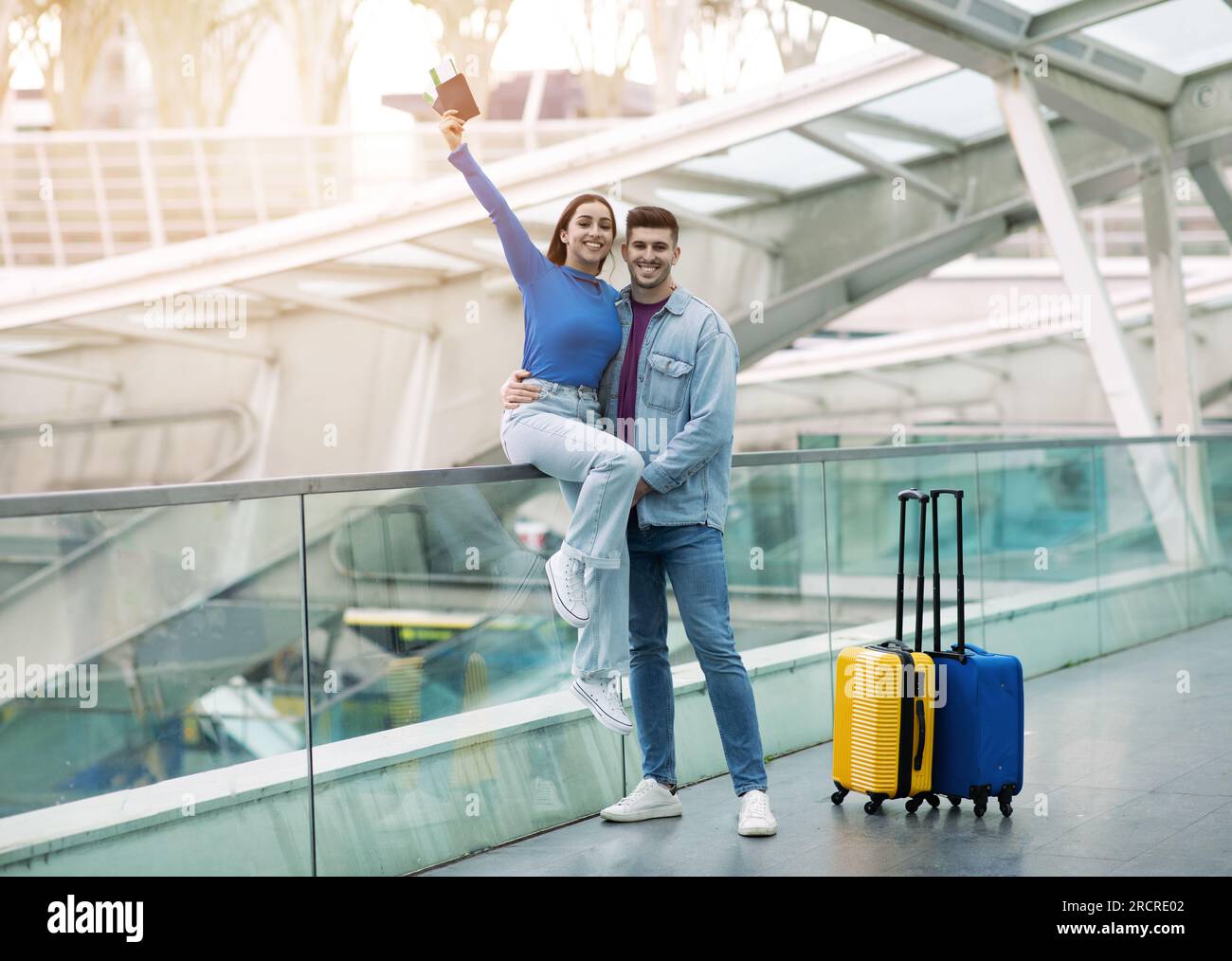 Happy Couple Tourists Posing With Boarding Passes At Bus Station Stock ...