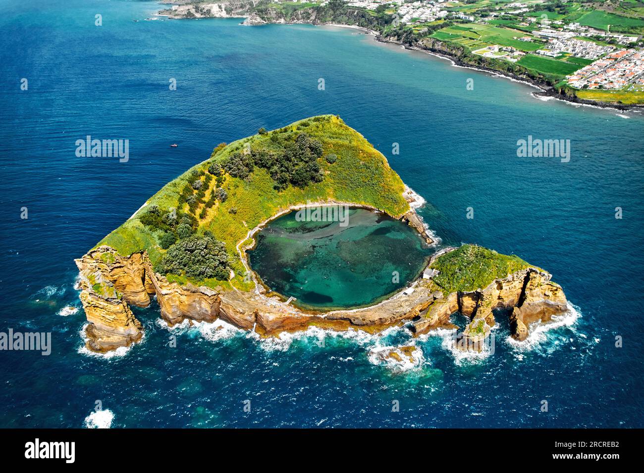 Aerial shot, drone point of view of picturesque Islet of Vila Franca do ...