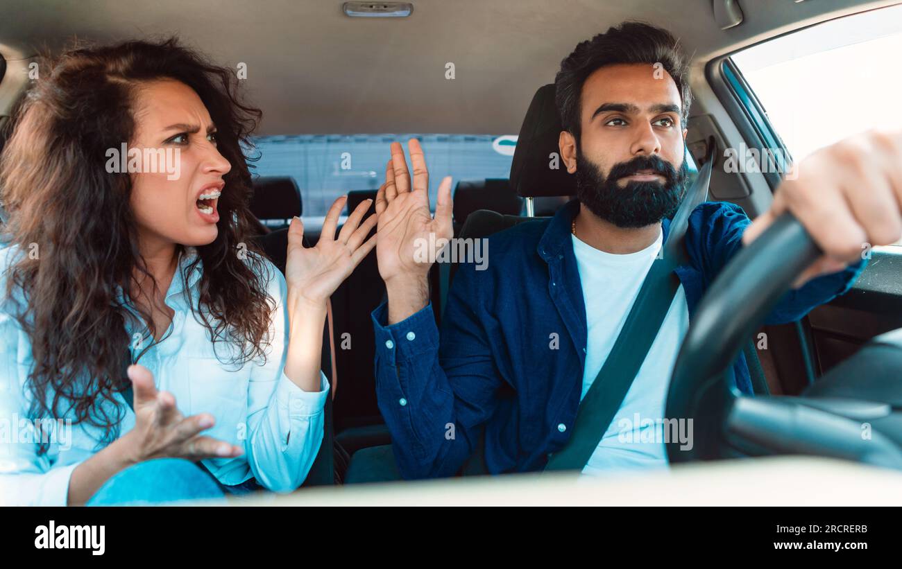 Emotional Middle Eastern Couple Having Conflict In Car Woman Shouting
