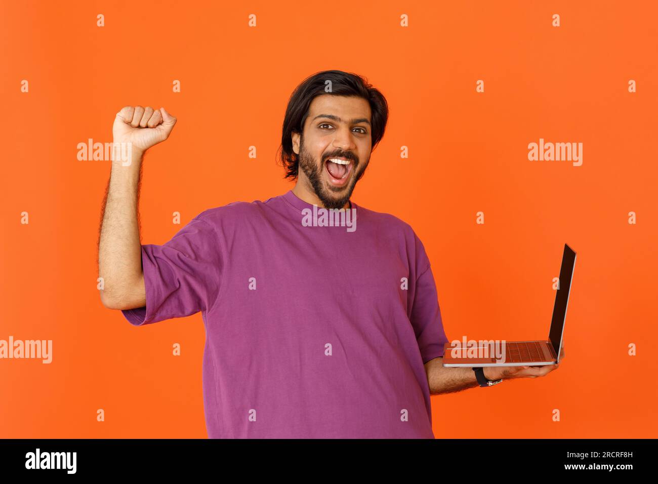 Thrilled young indian guy hi-res stock photography and images - Alamy