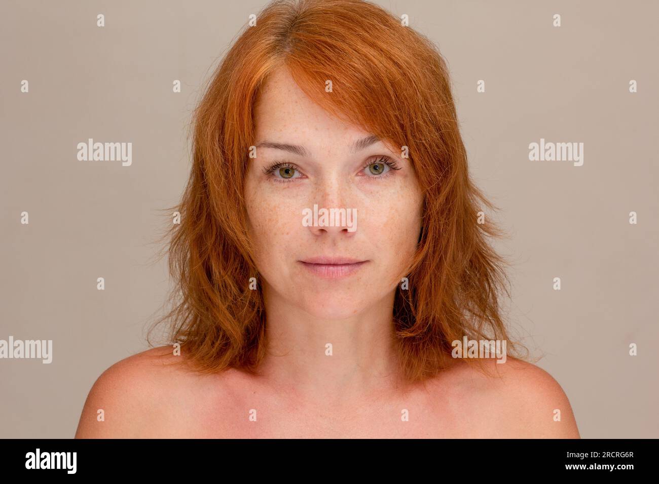 Portrait of caucasian middle aged woman of 40s with reddish hair ...
