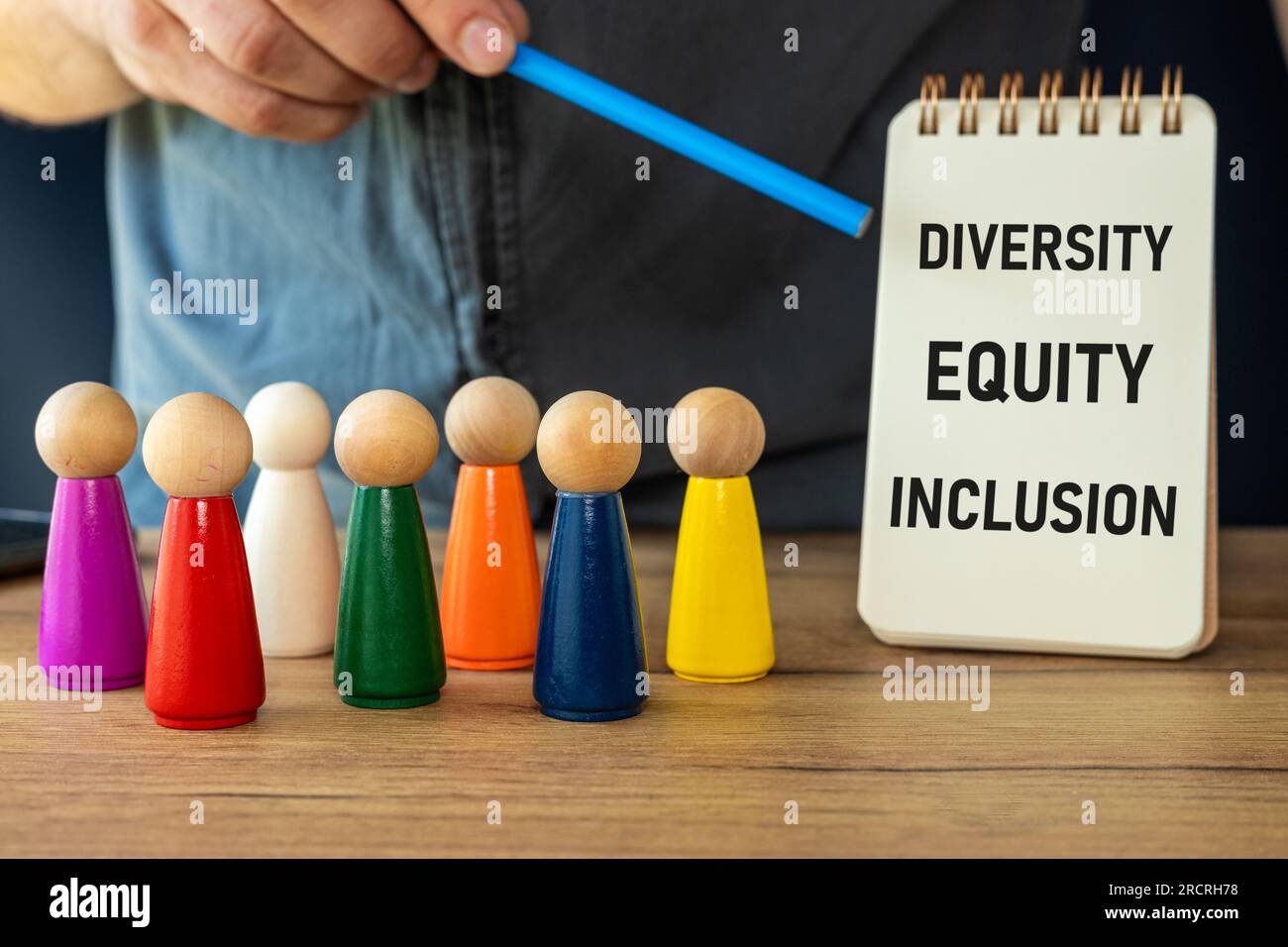 different colored miniature figures of people, the concept of diversity ...