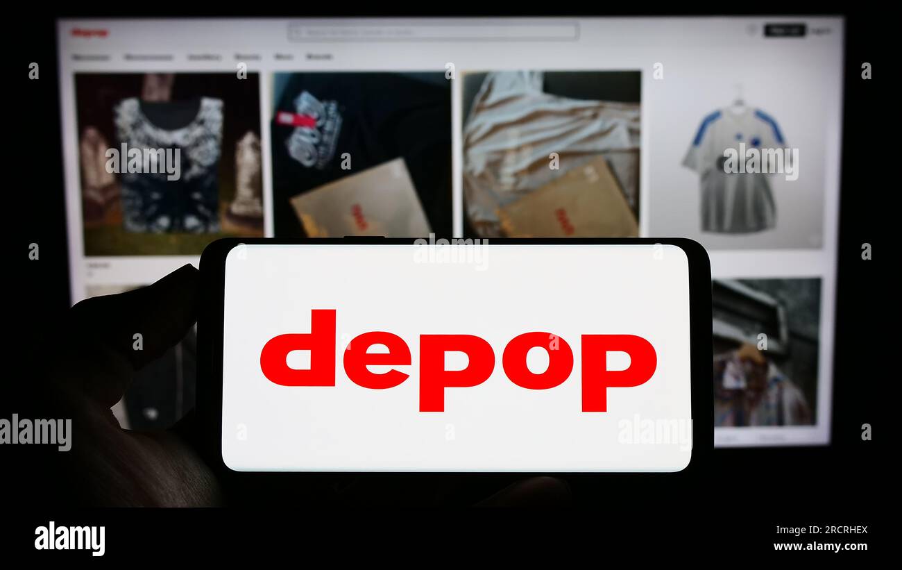 Hand holding mobile phone depop hi-res stock photography and images - Alamy