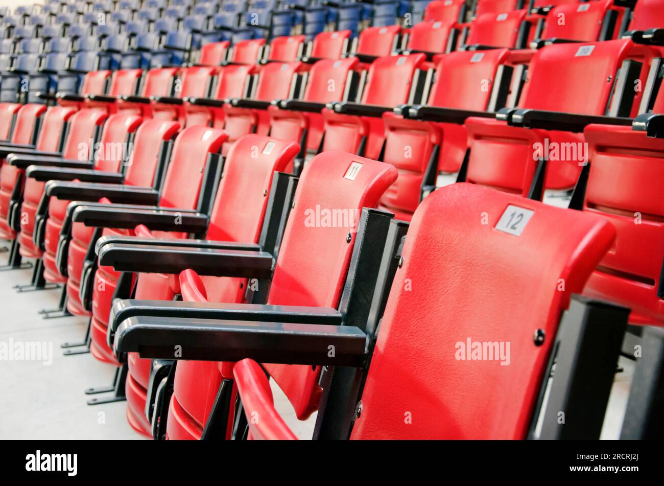 Modern conference room full of yellow, blue and red seats Stock Photo ...