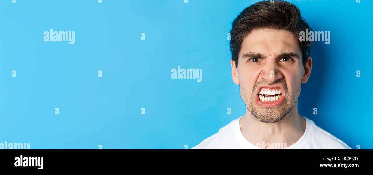 Headshot of angry caucasian man looking with scorn and dismay, being ...