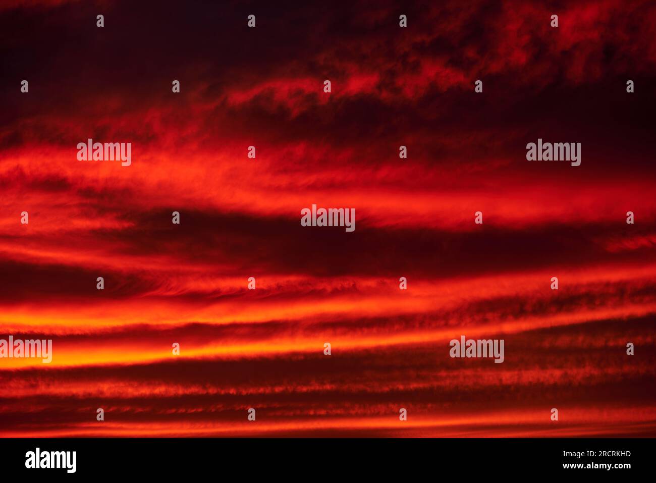 Sunset. Heaven, orange sky Sun rays Wallpaper Clouds Stock Photo - Alamy