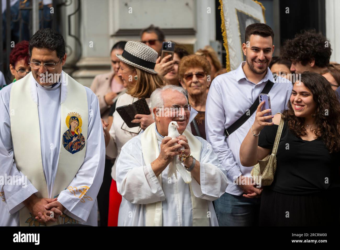 London, UK. 16 July 2023. A priest prepares to release a dove outside ...