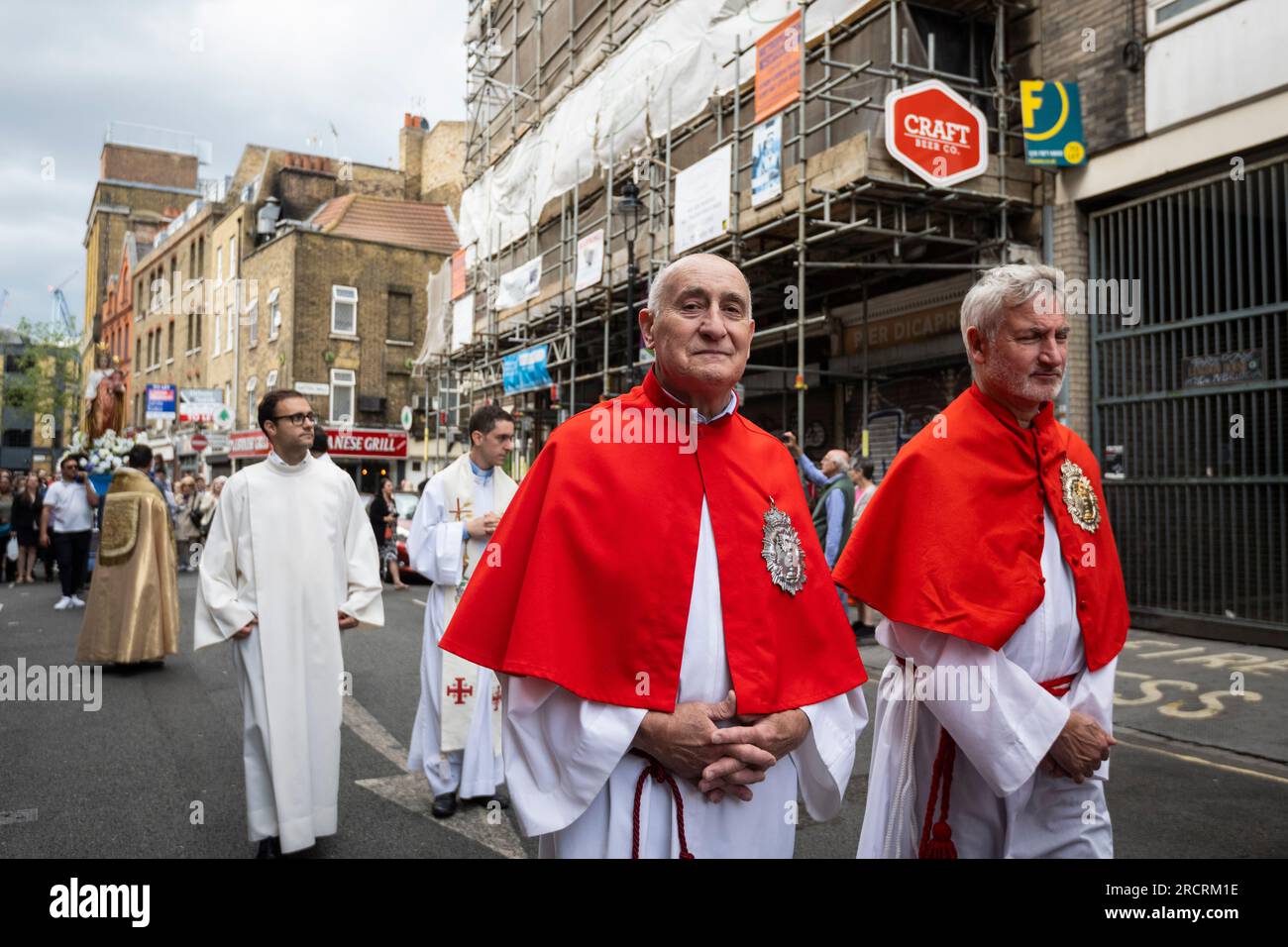 London, UK. 16 July 2023. Priests take part in the Procession of Our ...