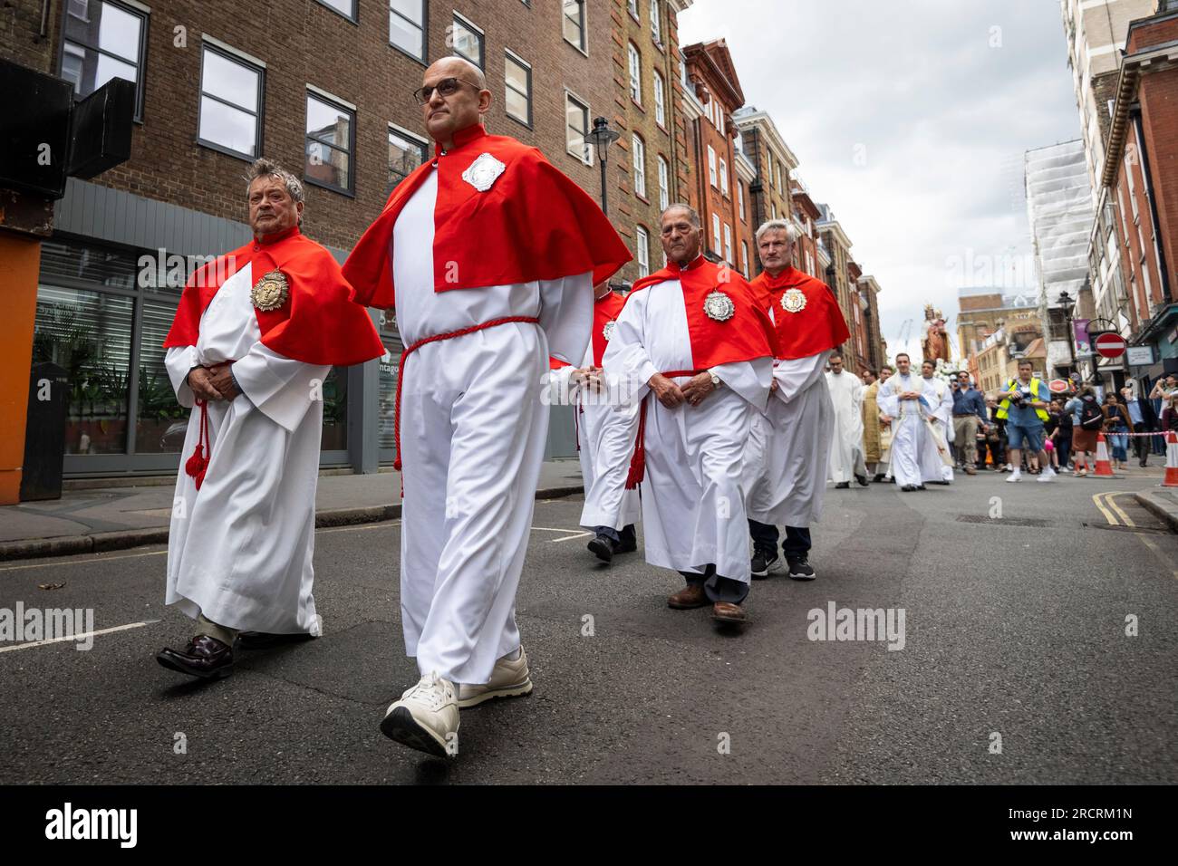 London, UK. 16 July 2023. Priests take part in the Procession of Our ...