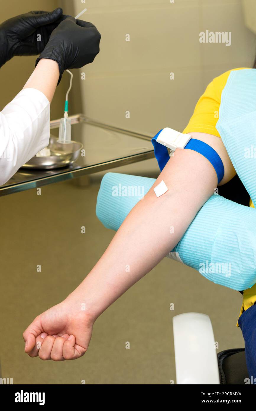 Woman doctor preparing taking blood hi-res stock photography and images ...