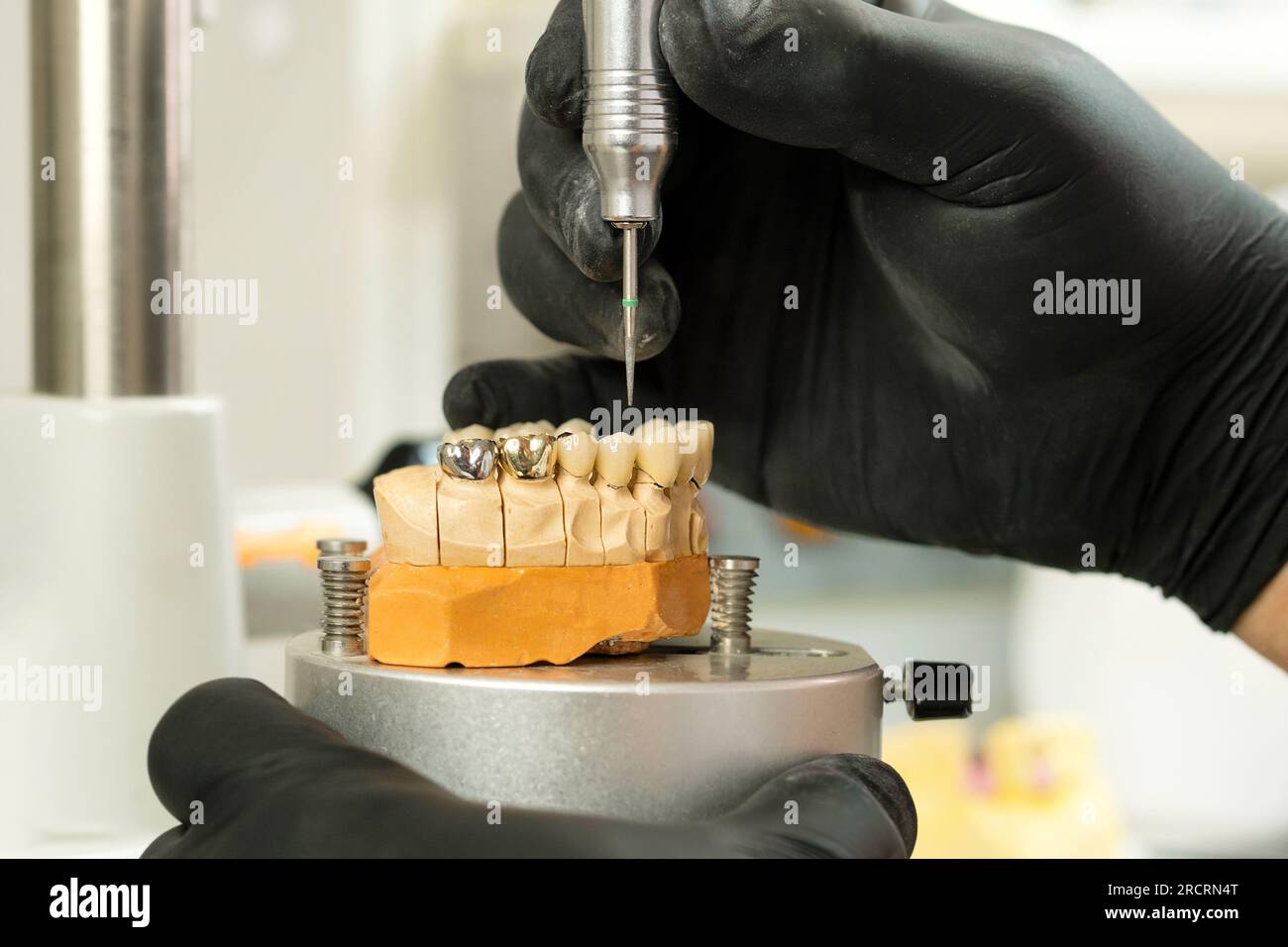 Manufacturing of dental crowns and dentures. Crown milling on High ...