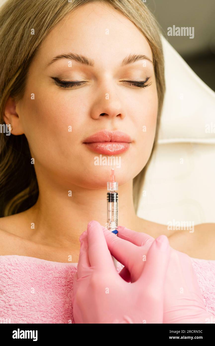 Cosmetician Makes Injections For Lip Augmentation Beautiful Woman Lip Augmentation With