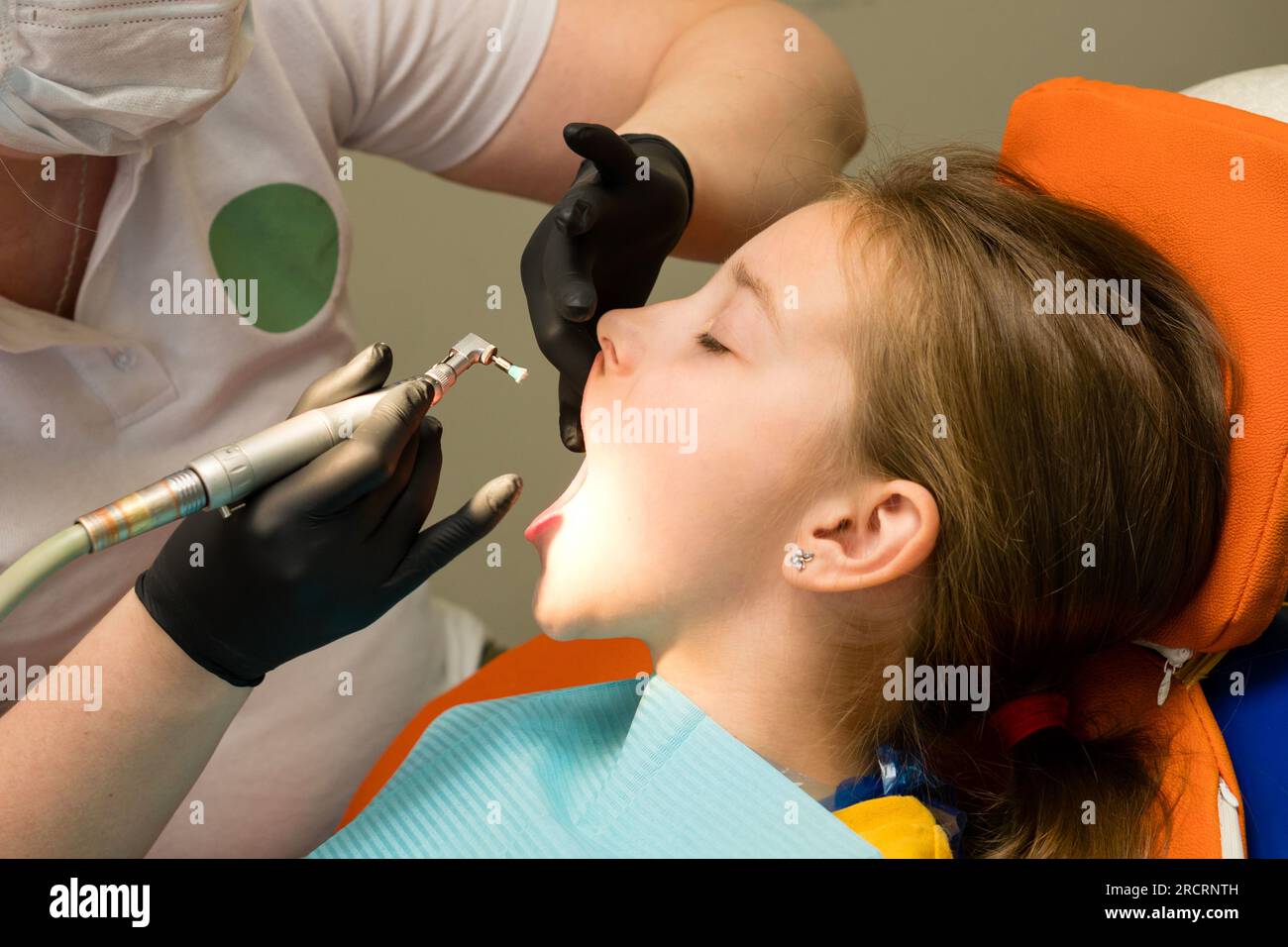 Girl on regular dental appointment at the dentist's office ...