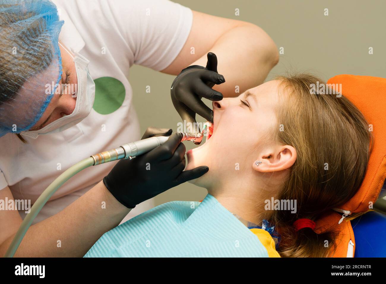Girl on regular dental appointment at the dentist's office ...
