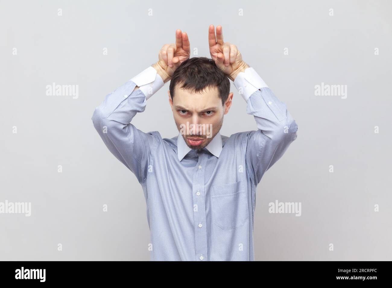 Portrait of angry serious aggressive man standing and showing bully ...