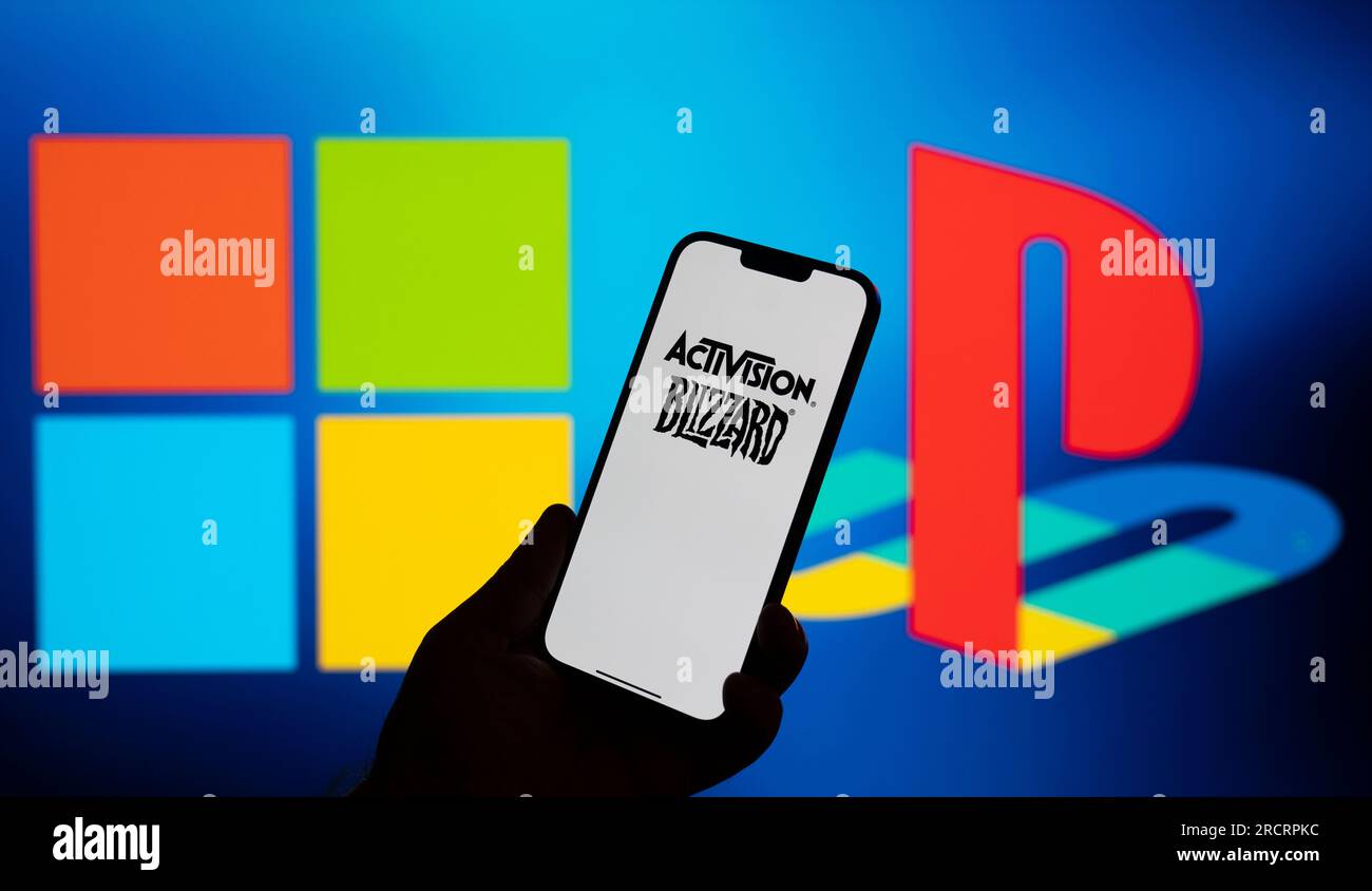 The Sony Playstation and MIcrosoft logos are seen in the background ...