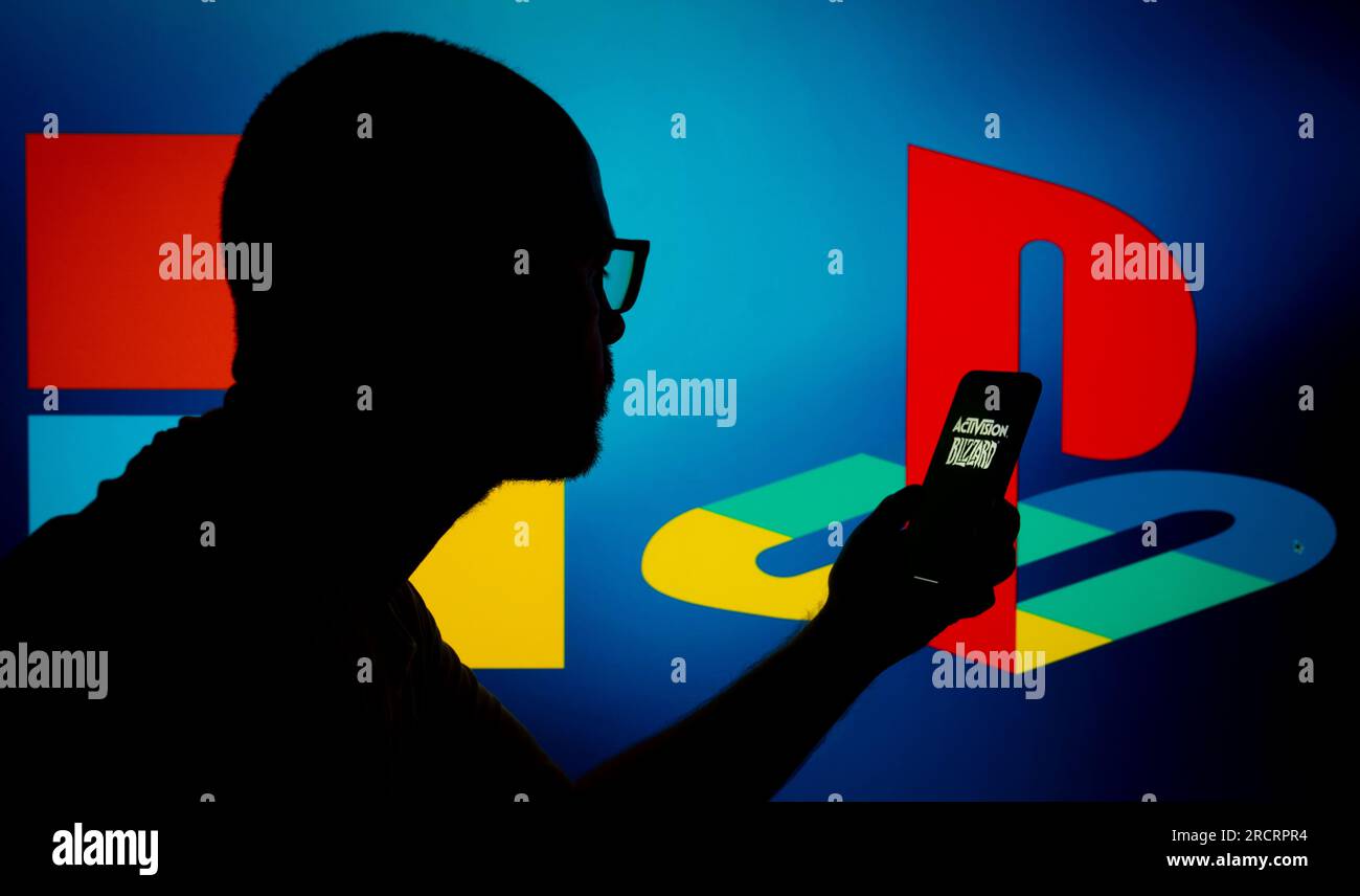 The Sony Playstation and MIcrosoft logos are seen in the background ...