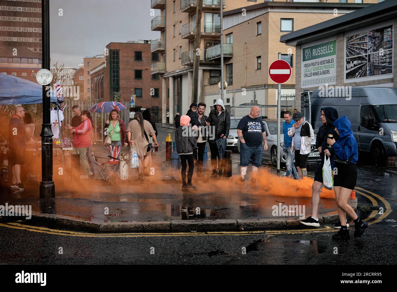 Locals gather on the streets in the Sandy Row area of Belfast in ...