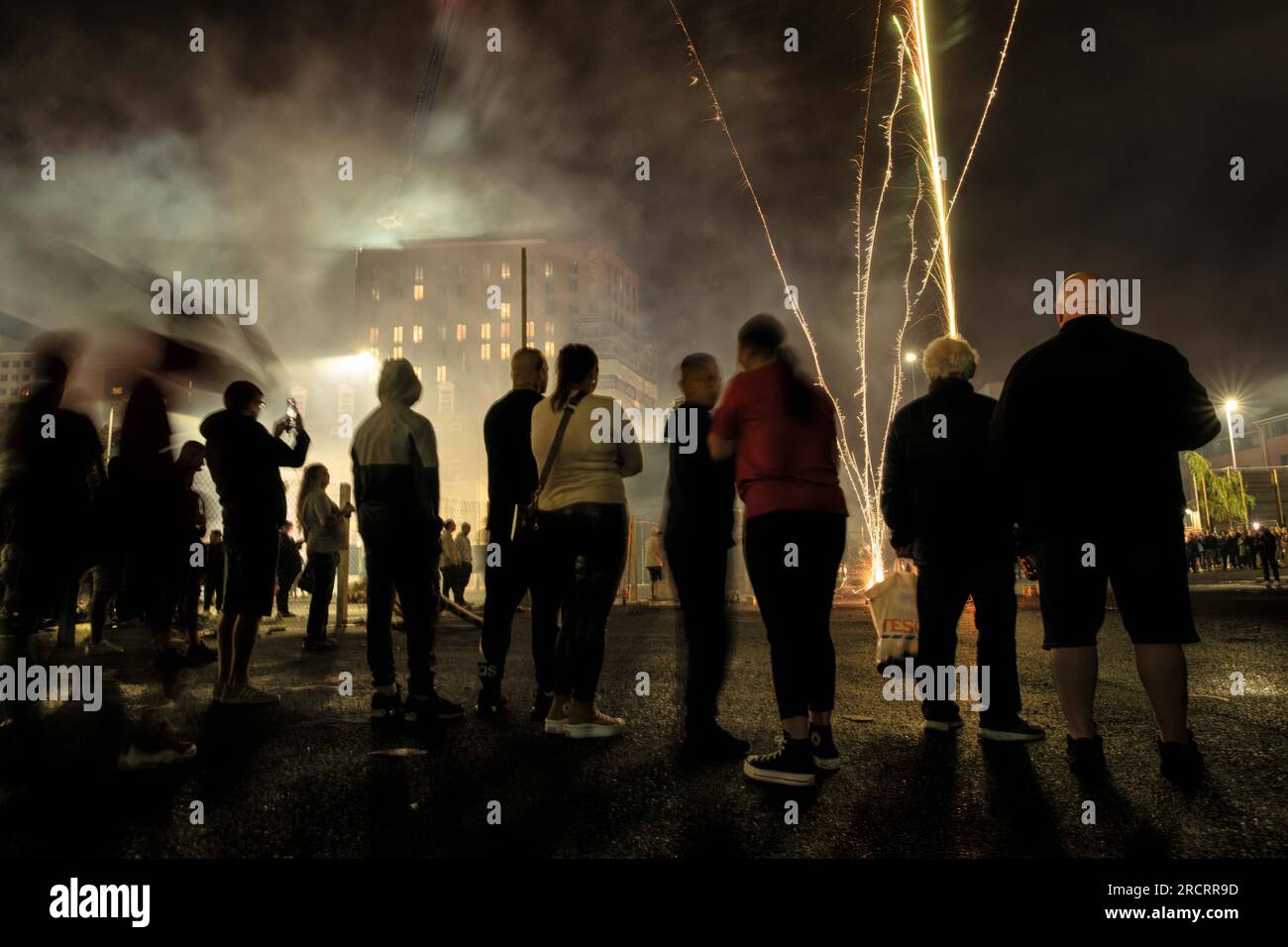 A fireworks display entertains the gathering crowds who have assembled ...