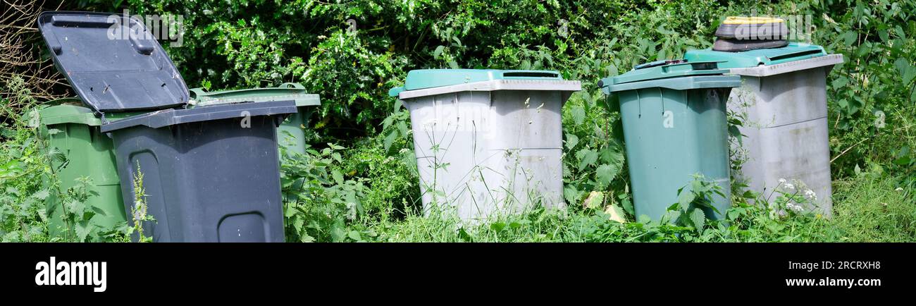 Wheelie bins in row for refuge collection in rural area Stock Photo - Alamy