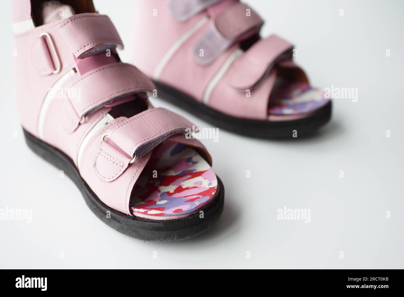 Child cerebral palsy legs orthosis shoes on white background Stock ...