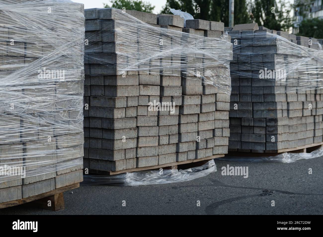 Clinker paving slabs are stacked: piles of building materials on the ...