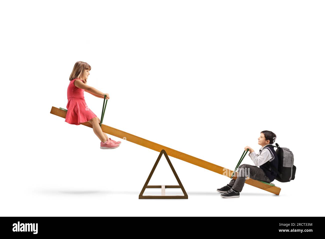 Sister and brother playing on a seesaw isolated on white background ...