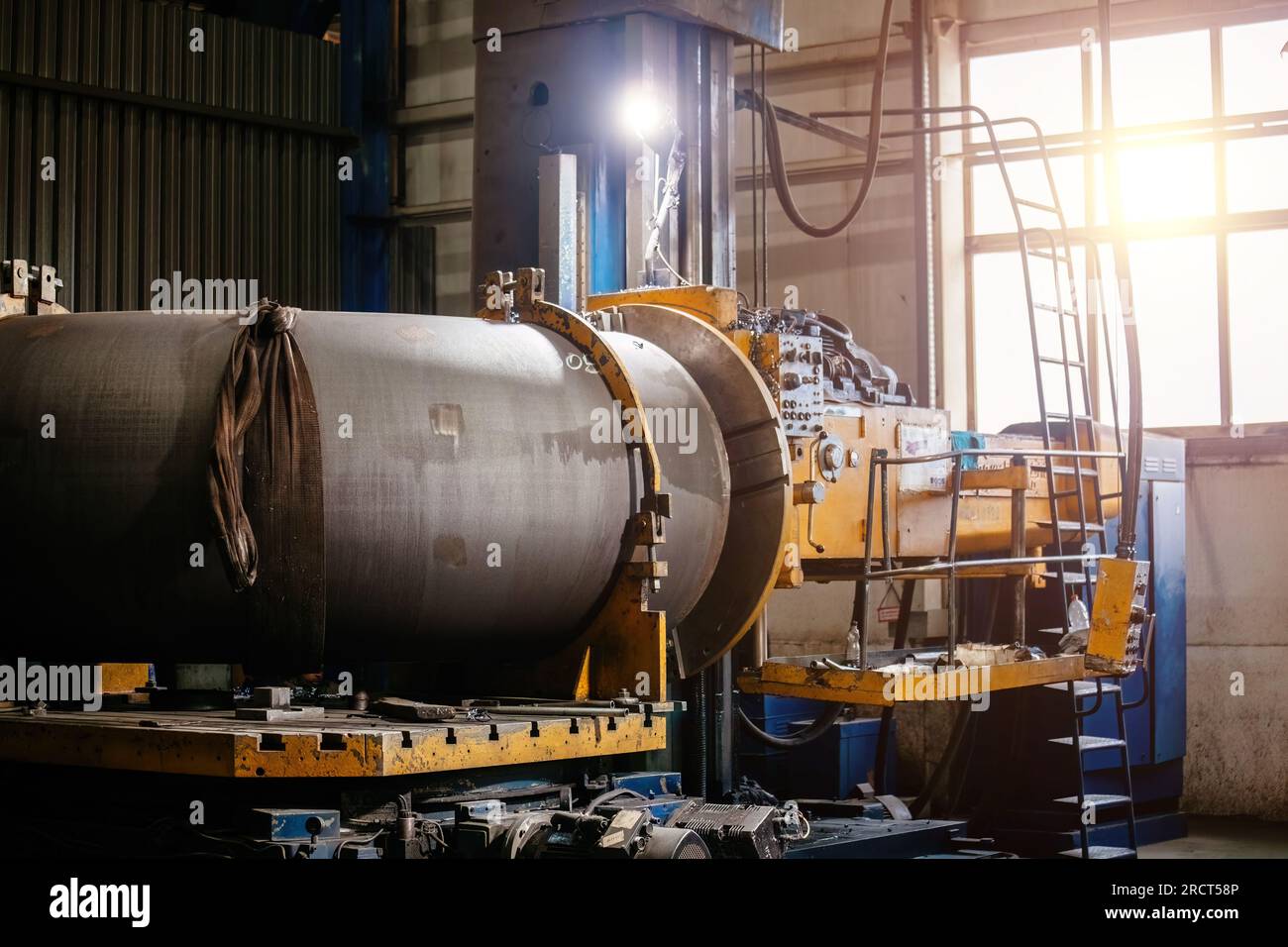 Large CNC tube bender in pipe factory Stock Photo - Alamy