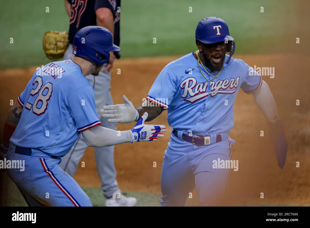 Texas Rangers' Adolis Garcia, right, celebrates with Jonah Heim, left ...