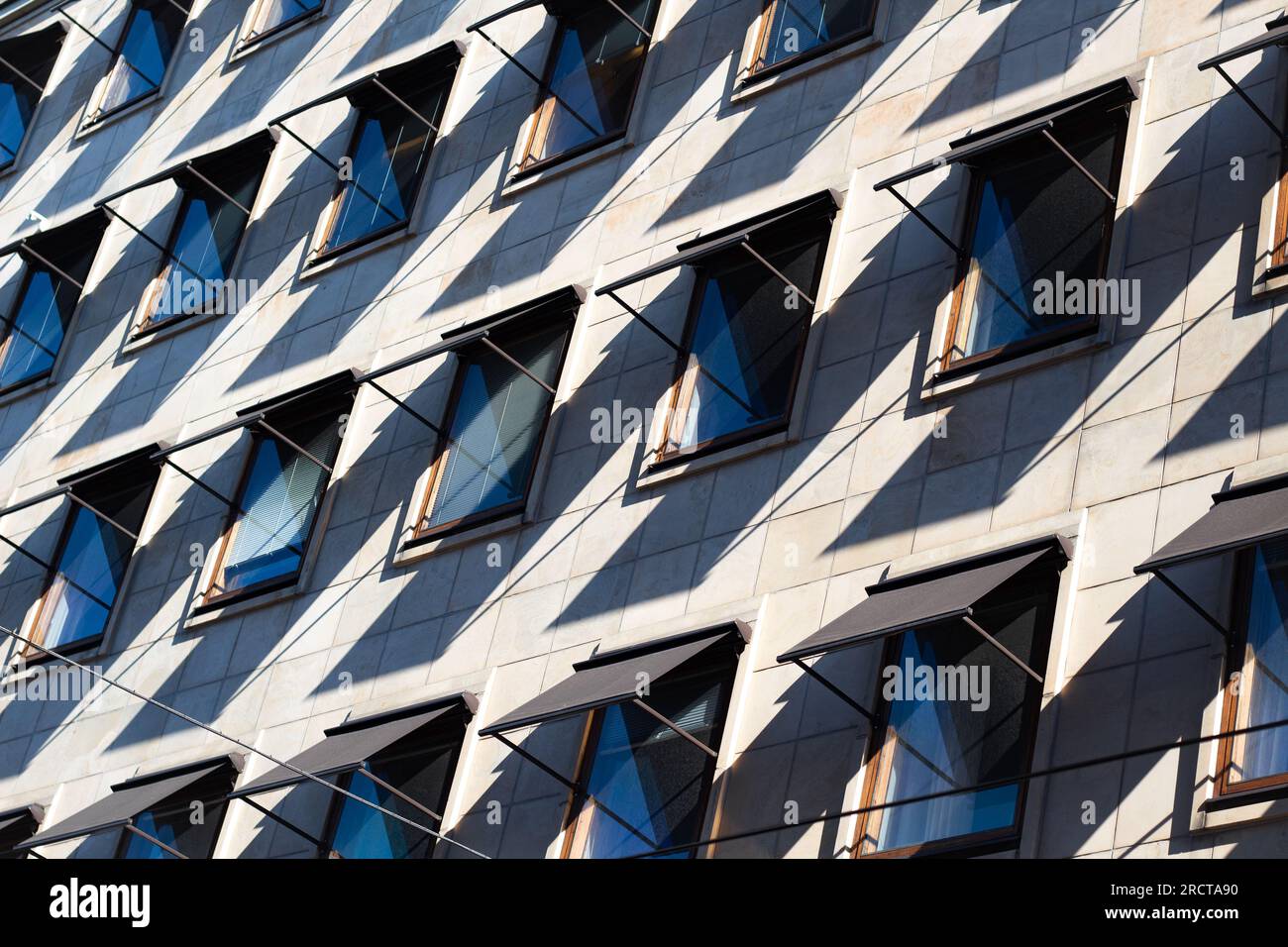 Open windows of a building in a city in Europe. This photo was taken ...