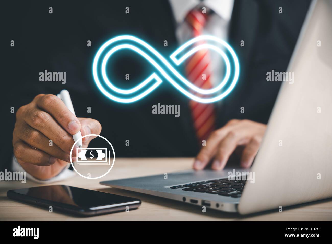 Businessman points to infinity symbol, representing limitless ...