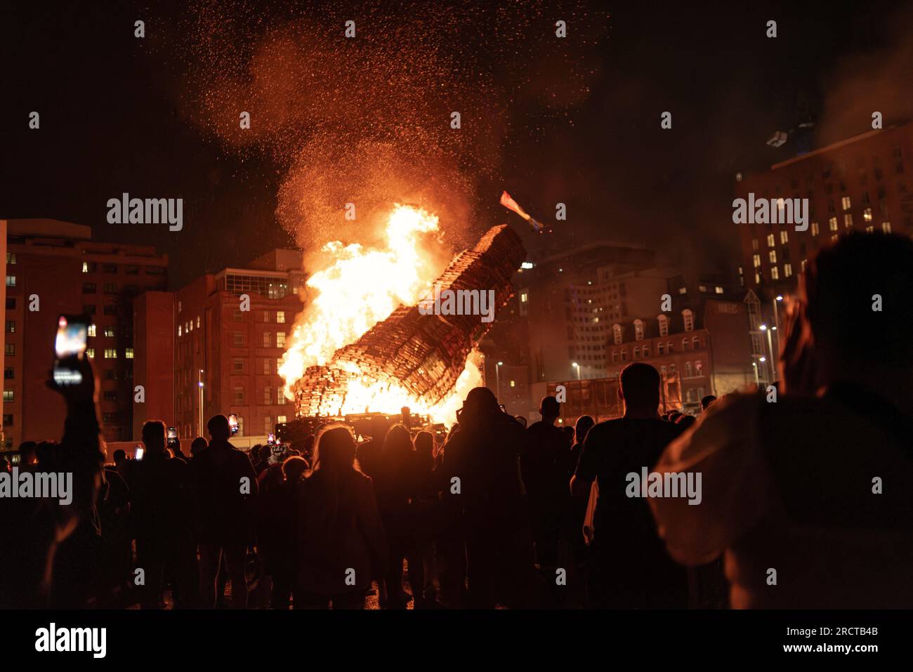 Protestants and loyalists gather to celebrate the 11th night while ...