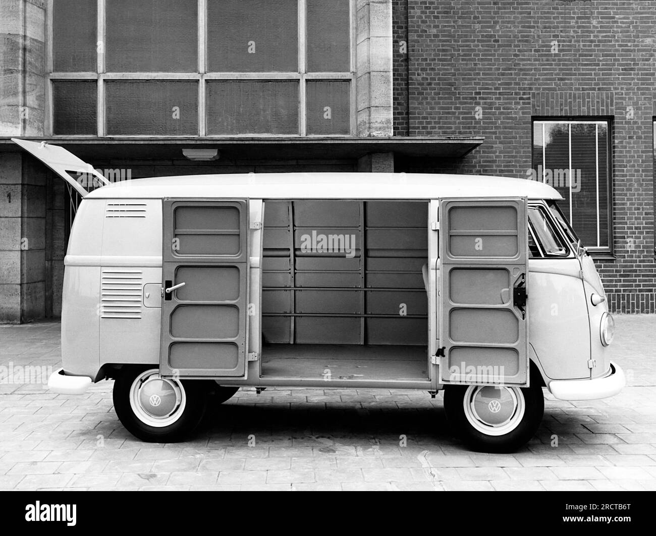 United States: 1960 A side view of a 1960 Volkswagon Microbus showing ...