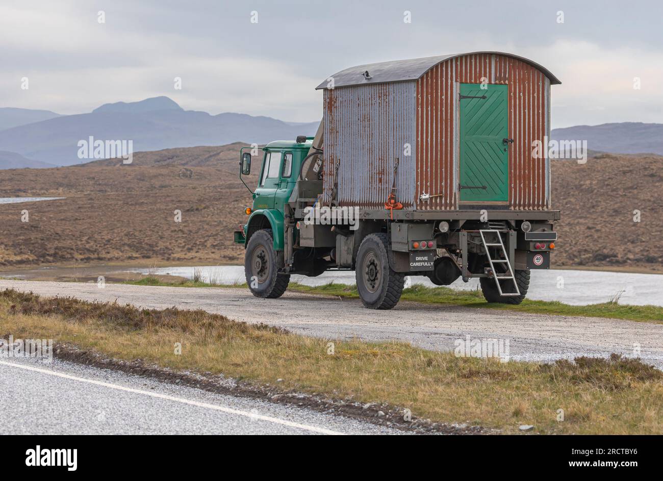 Old fashioned tin shed on the back of a truck used in the past ...