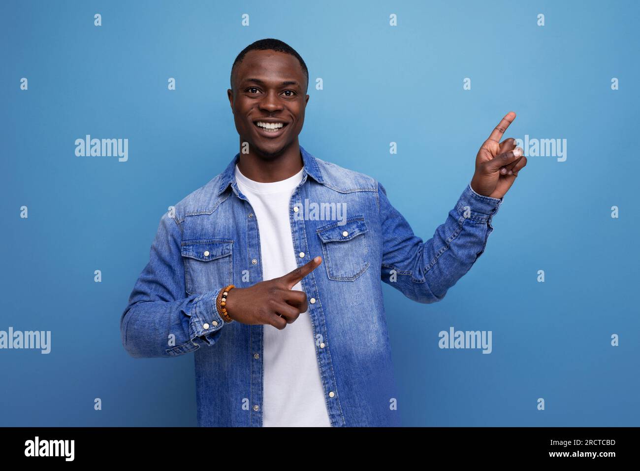 handsome young attractive african man dressed casually in denim clothes ...