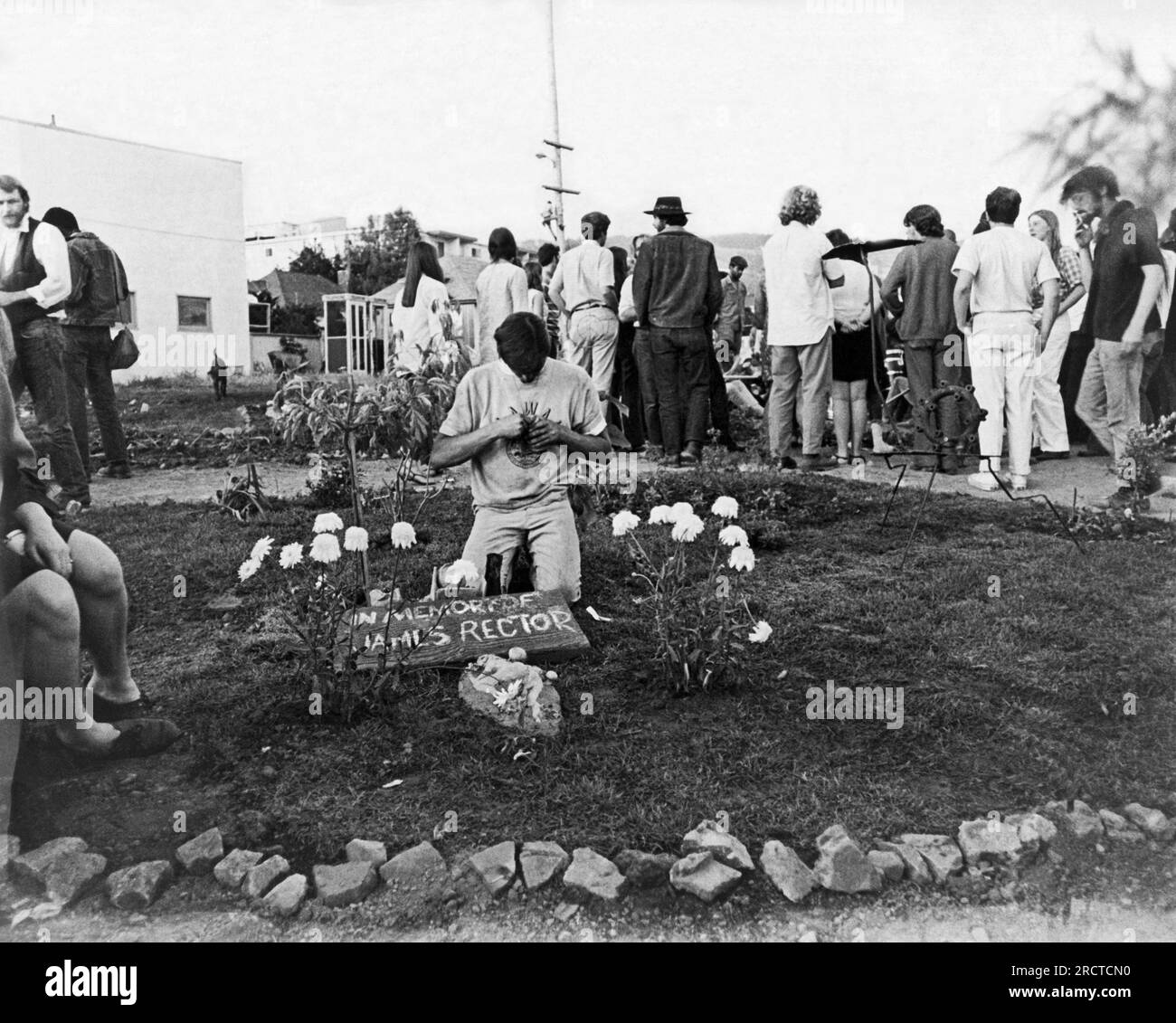 Berkeley, California: May 29, 1969 A young man kneels at the James ...