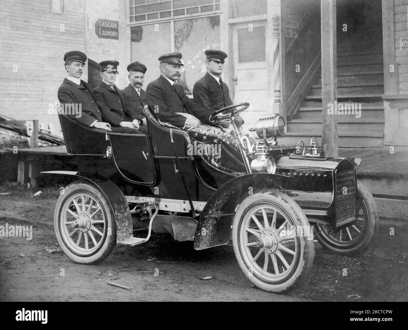 United States: c. 1906 Five men riding in an early automobile Stock ...