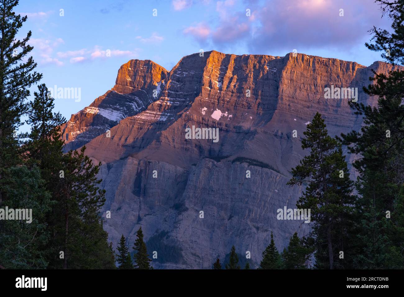 Sunset sky over Mount Rundle in Banff National Park during summer time ...