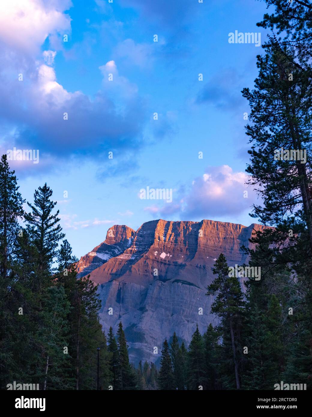 Sunset sky over Mount Rundle in Banff National Park during summer time ...