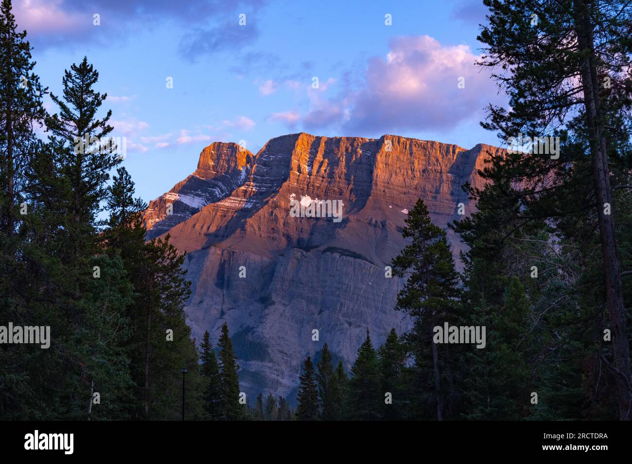Sunset sky over Mount Rundle in Banff National Park during summer time ...