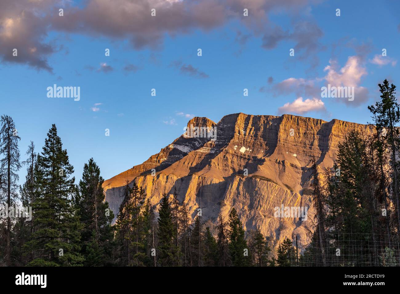 Sunset sky over Mount Rundle in Banff National Park during summer time ...