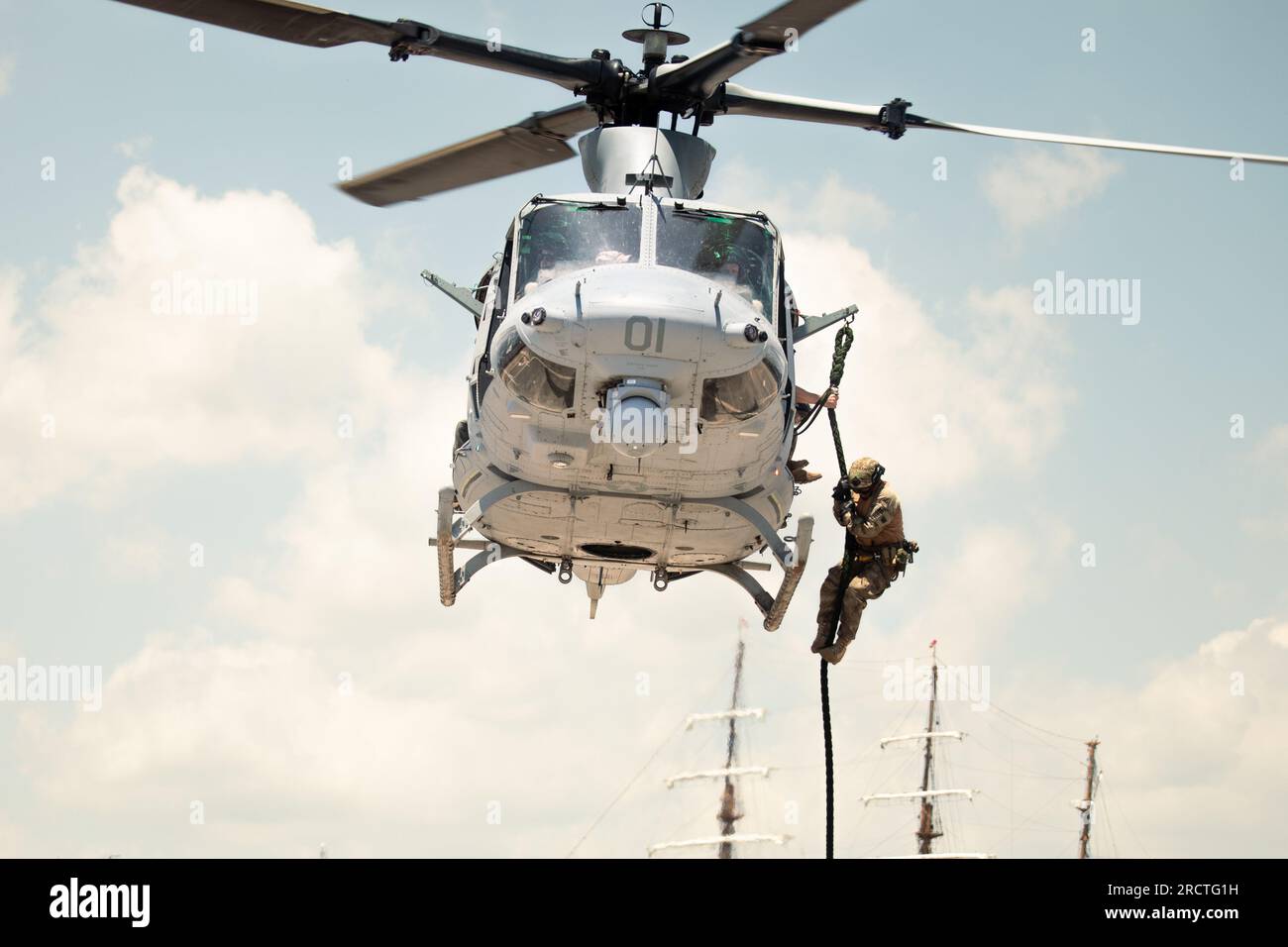 A Peruvian Marine fast ropes from a U.S. Marine Corps UH-1Y Venom ...