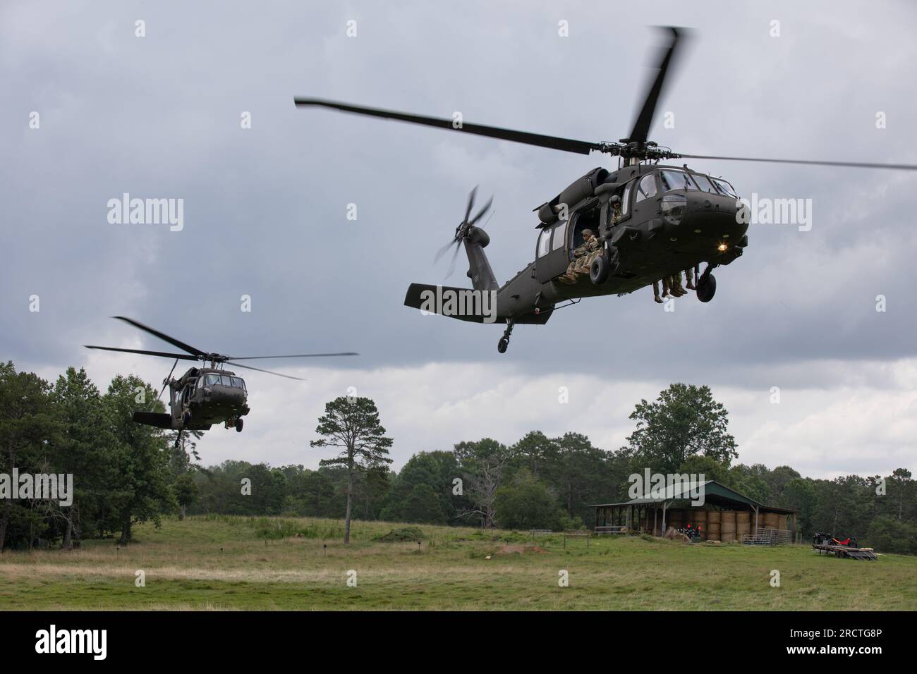 Two U.S. Army UH-60 Black Hawk Helicopters, assigned to Charlie Company ...