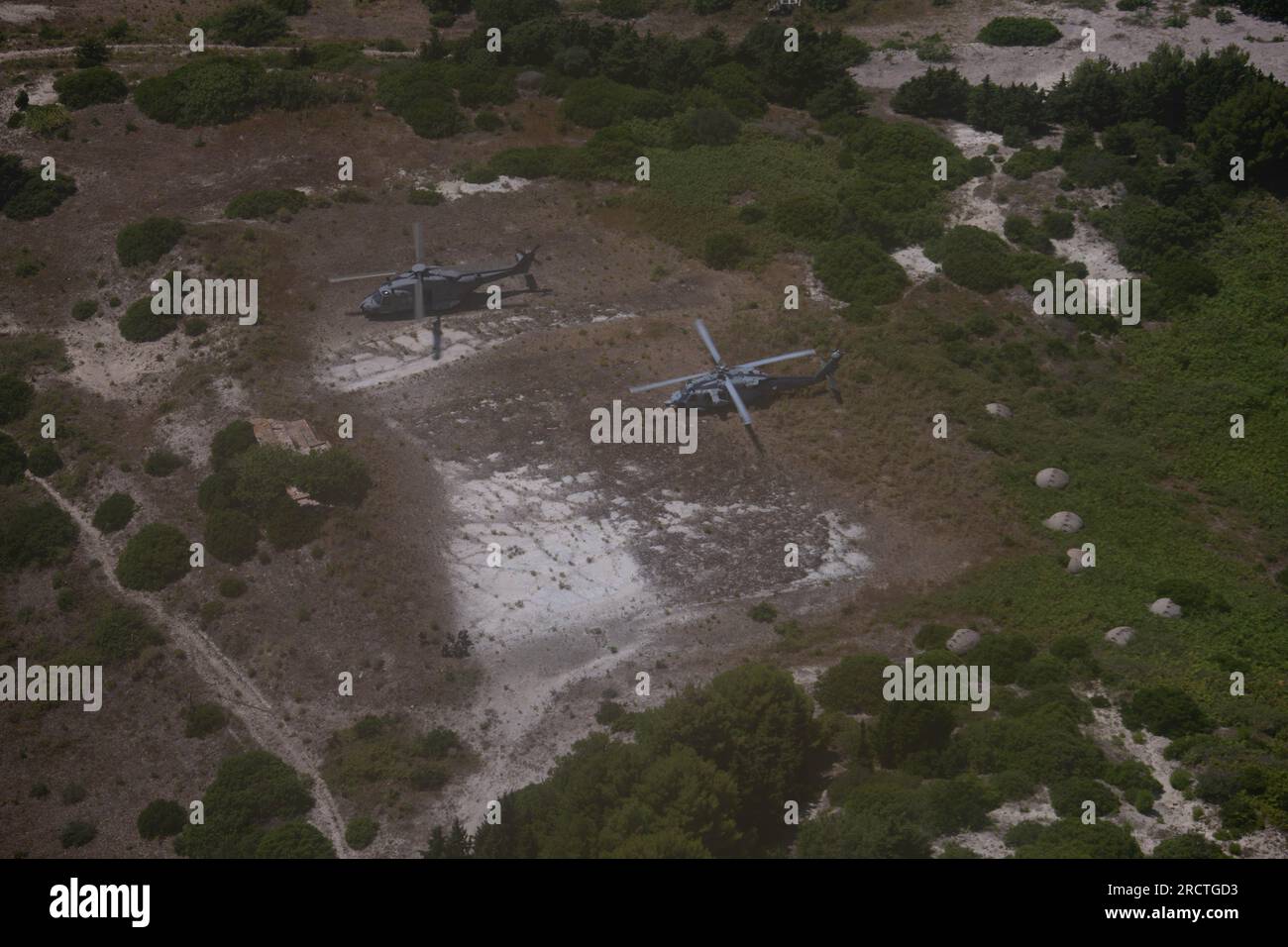 An Italian Navy NH90 NATO frigate helicopter and an MH-60S Sea Hawk ...