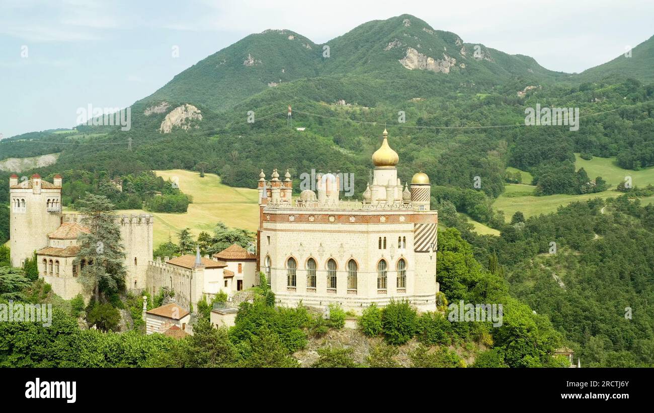 Aerial drone panoramic view of the Rocchetta Mattei castle in Italy on ...