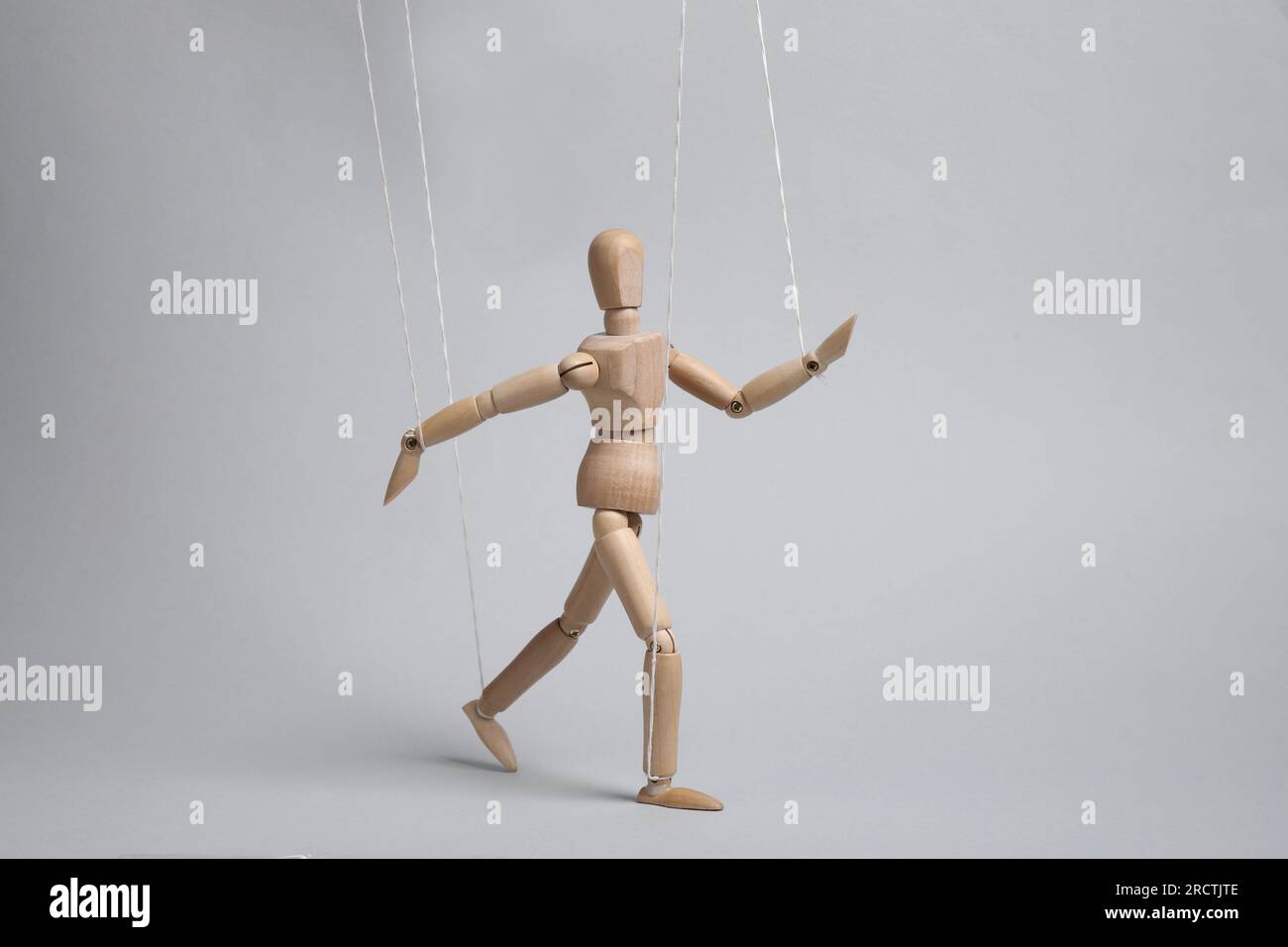 Wooden Puppet On A String